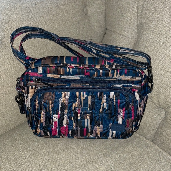 lug | Bags | Lug Carrousel Crossbody Bag Black Blue Brown Raspberry ...